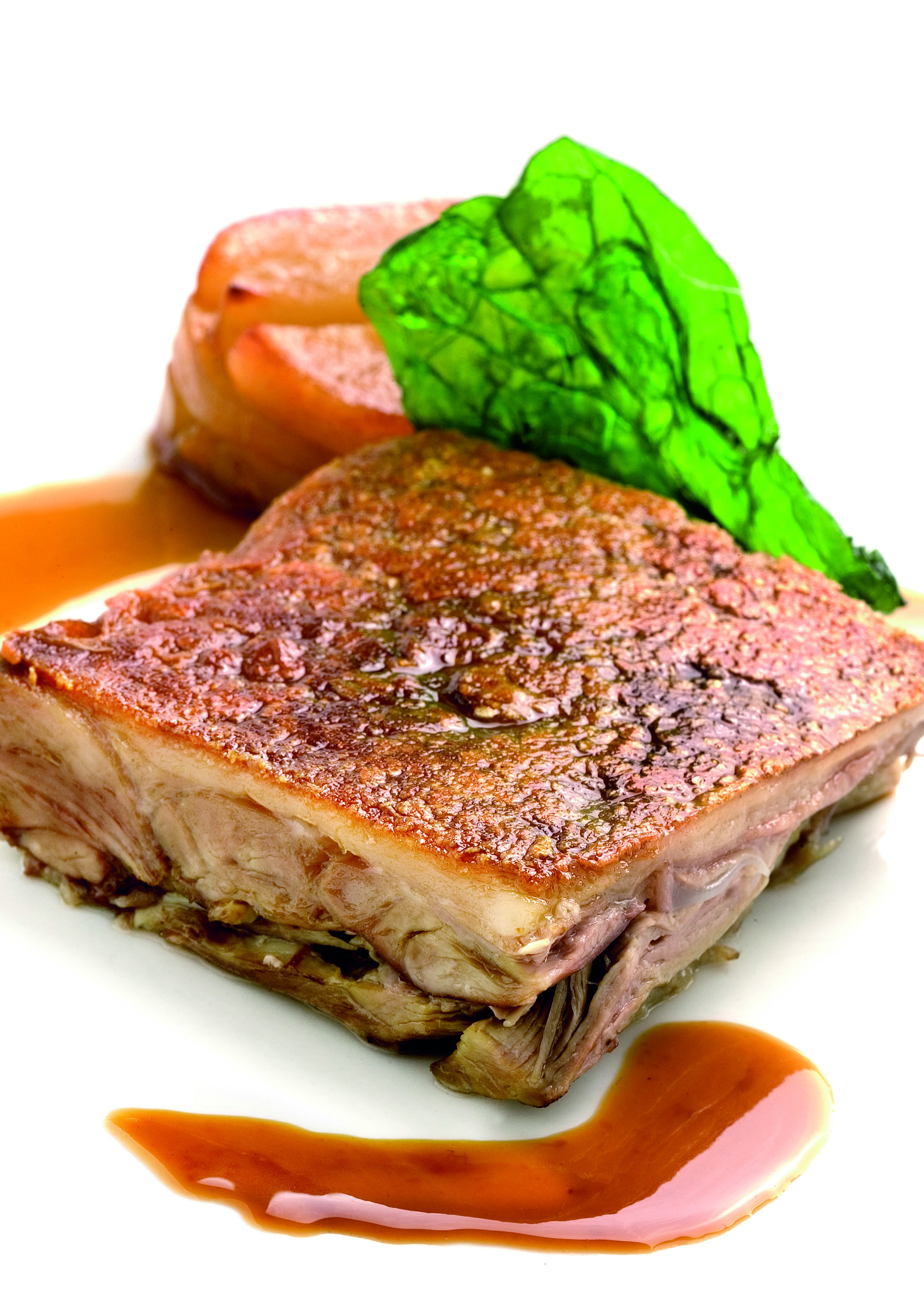 Porcell ibèric confitat amb poma caramel·litzada